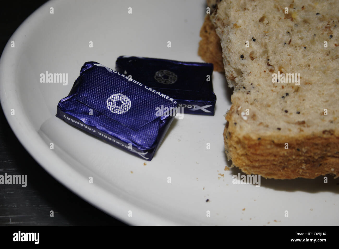 bread and butter on plate Stock Photo - Alamy