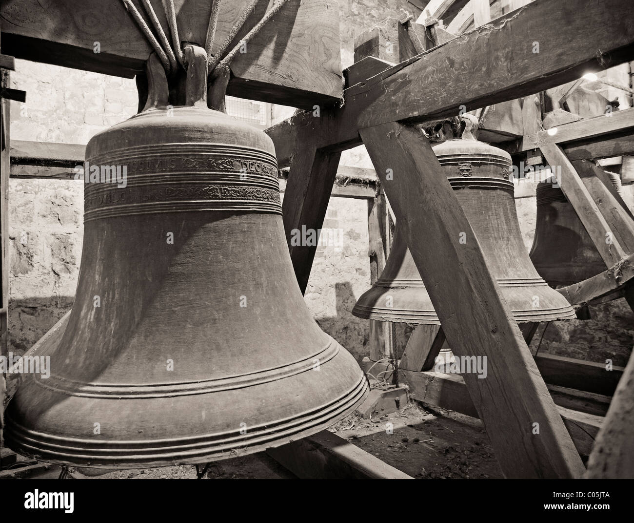 Traditional old bells in a church tower from the middle ages in black ...