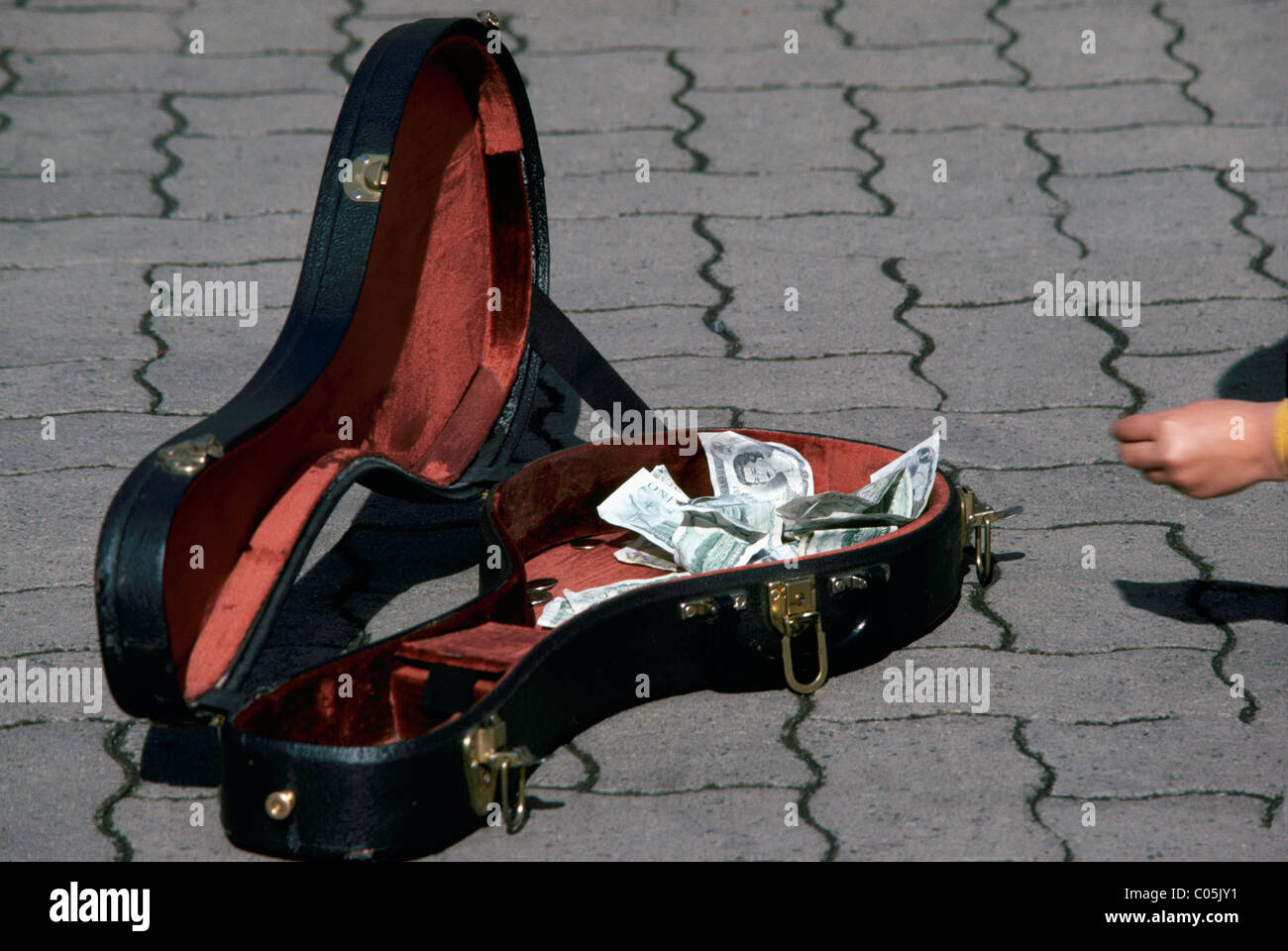 Collecting money hi-res stock photography and images - Alamy