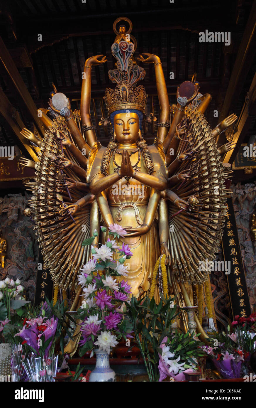 Multi armed buddha statue in Longhua Temple, Shanghai China Stock Photo ...