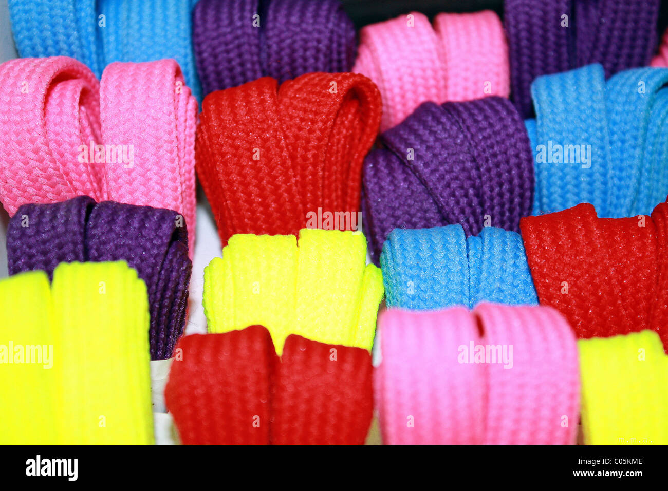 Funny colored laces for the shoes Stock Photo - Alamy