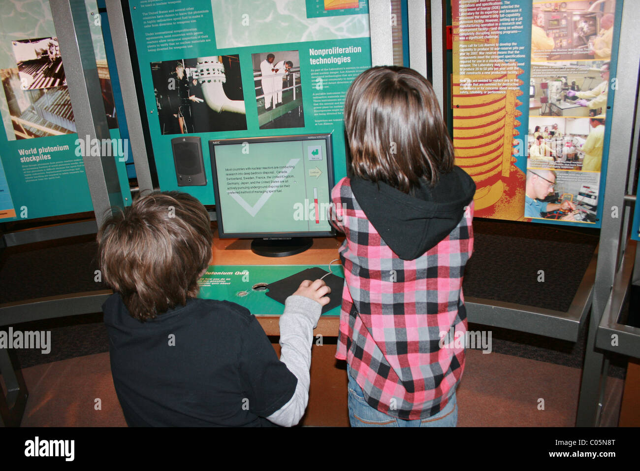 Children learning about storage of plutonium, Science museum Stock ...