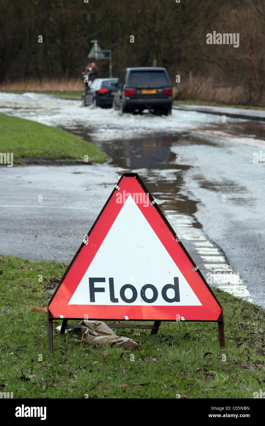 A flood warning sign on a road in Essex Stock Photo - Alamy