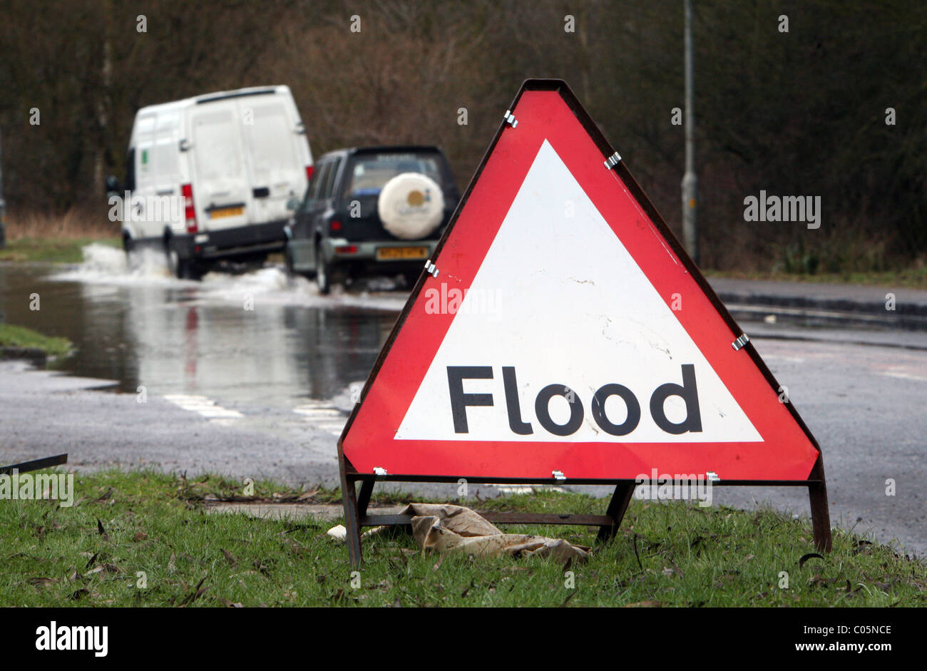 Triangular Flood Warning Sign High Resolution Stock Photography and ...