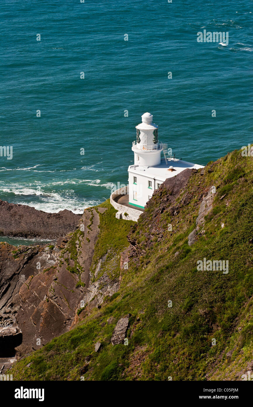 Hartland Point lighthouse, Devon, against a backdrop of blue sea Stock ...