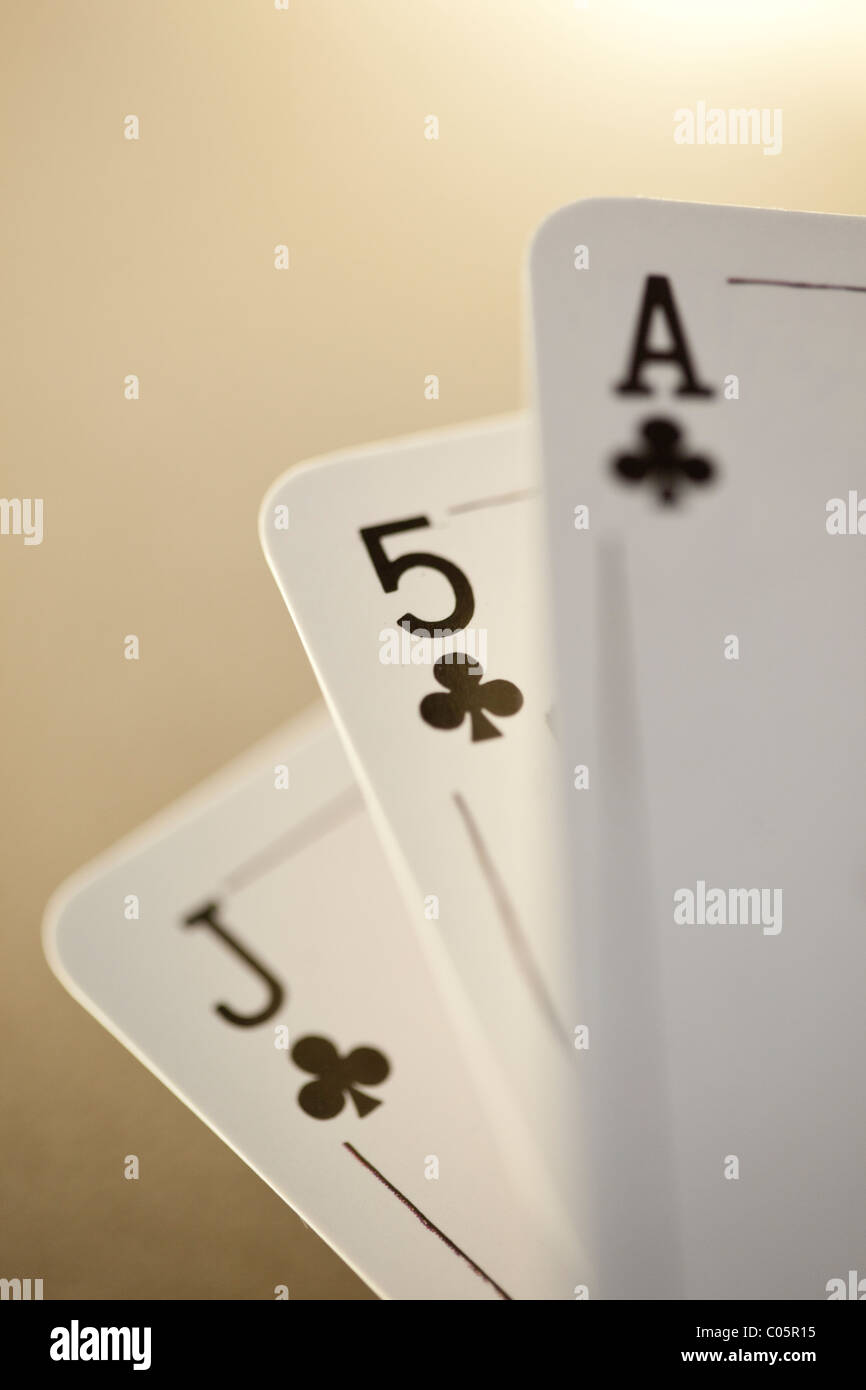 3 playing cards Stock Photo - Alamy