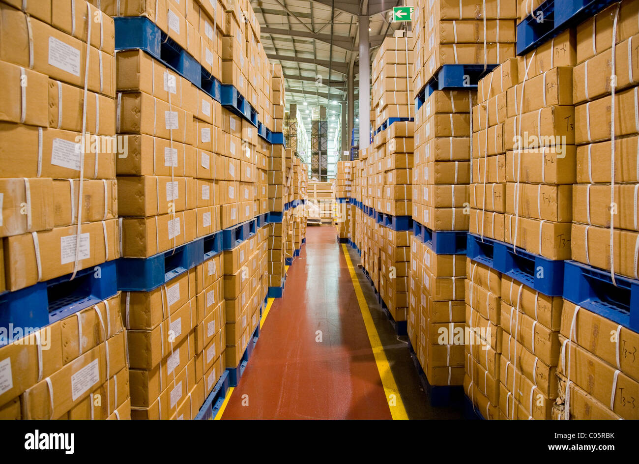 warehouse with goods packages on pallets Stock Photo - Alamy