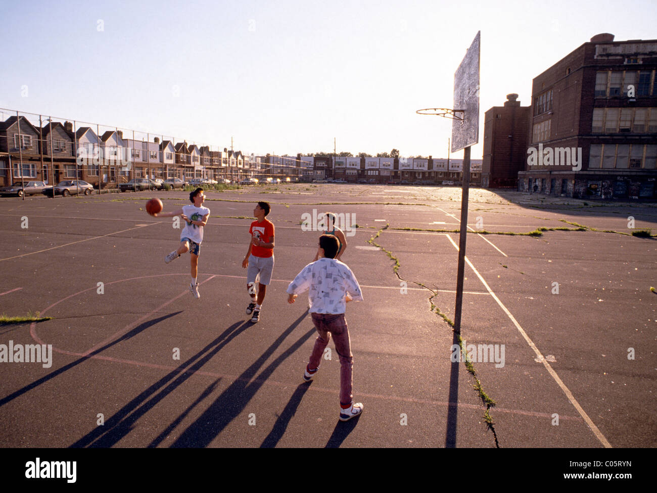Kids Playing Basketball At Recess