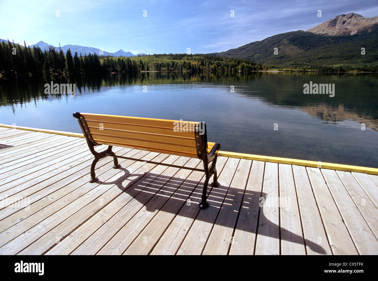 Bench on a dock at Pyramid Lake, Jasper National Park, Alberta, Canada ...