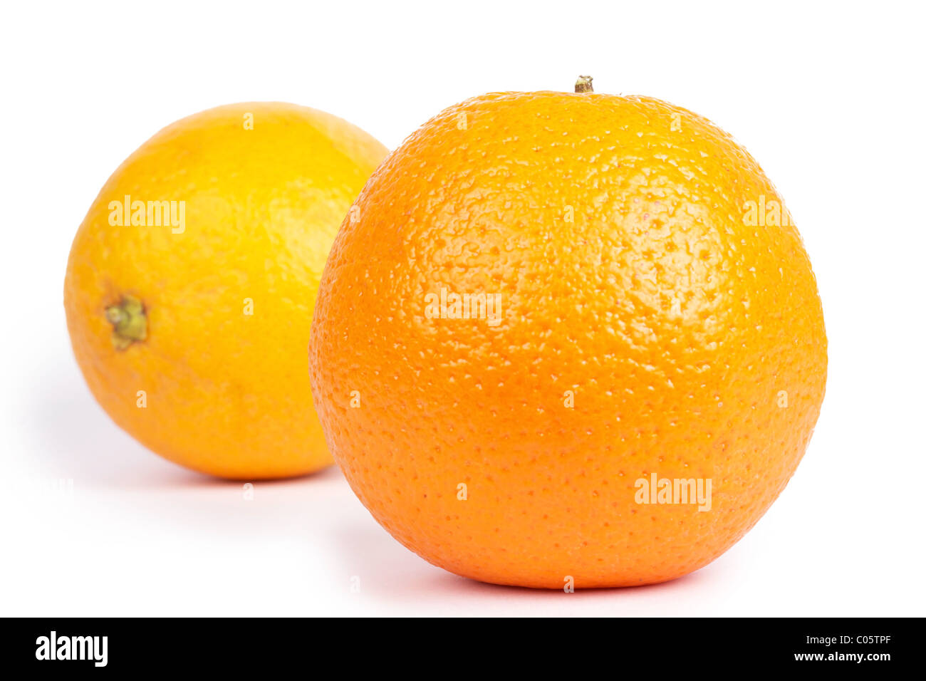 Two oranges isolated on white, closeup Stock Photo - Alamy