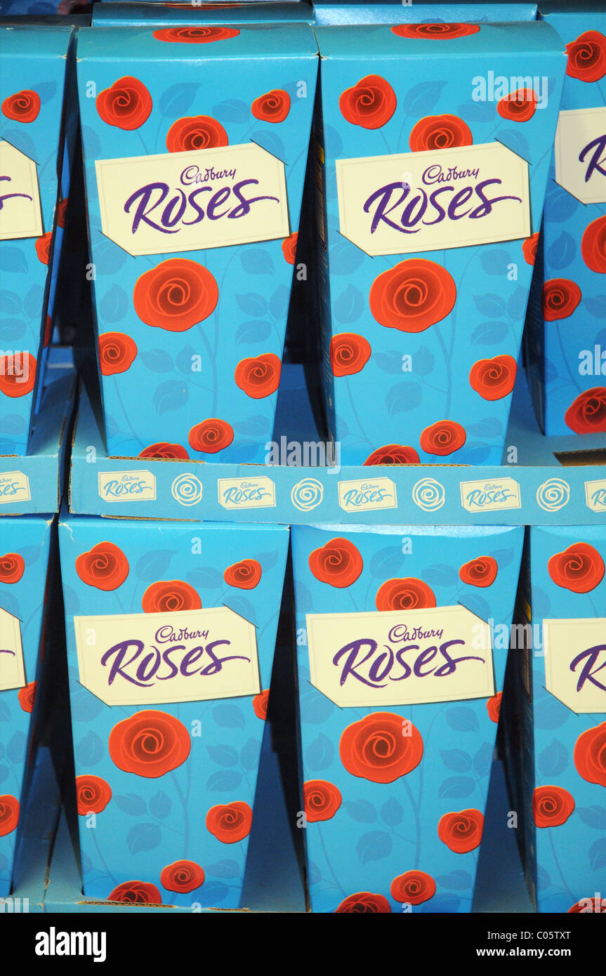 Boxes of Roses chocolates on a shelf in a supermarket in England Stock ...
