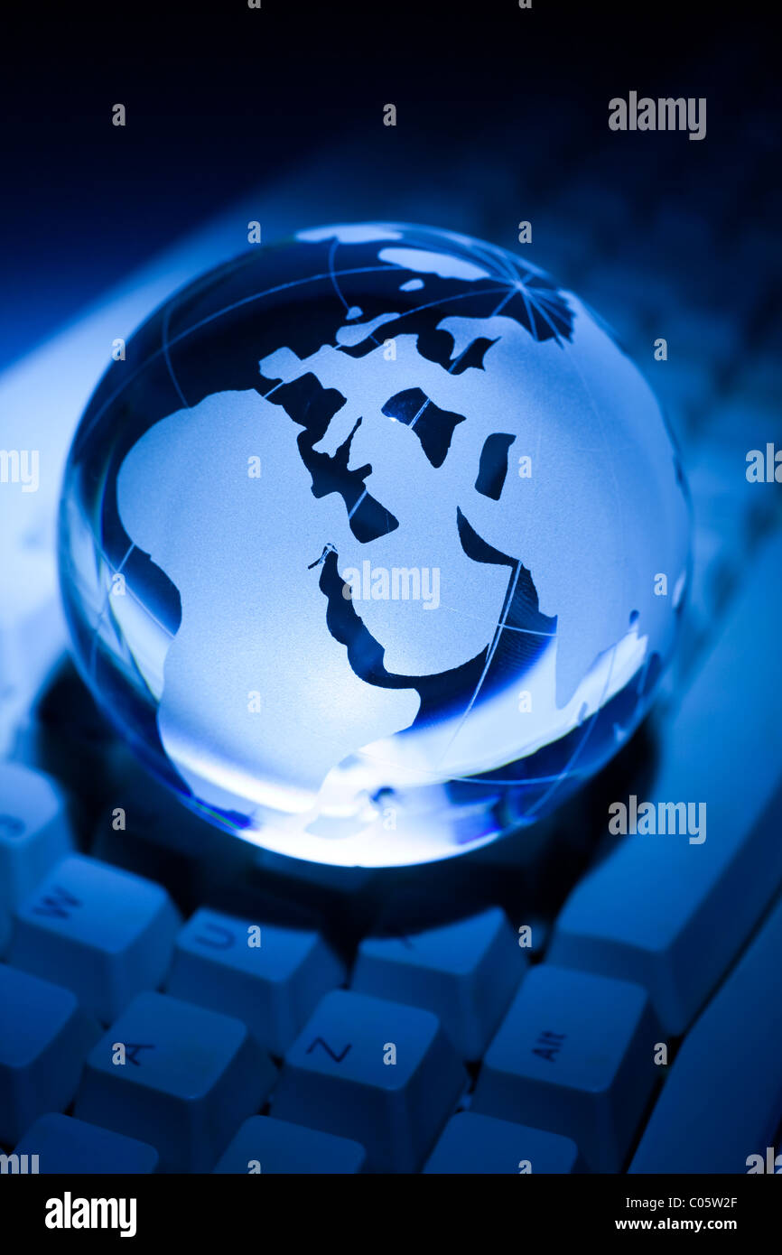 Blue Globe and Computer Keyboard for background Stock Photo - Alamy