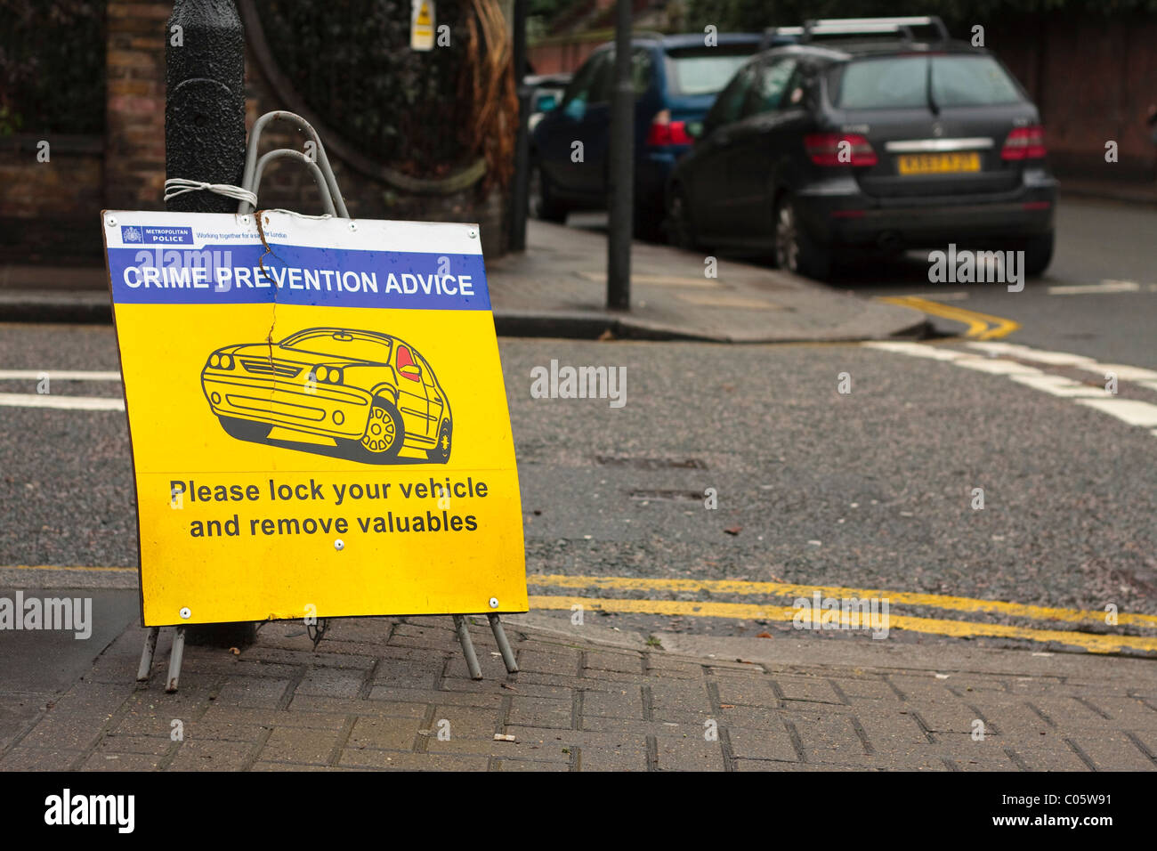 Met police crime provention sign warning drivers with vehicles in ...