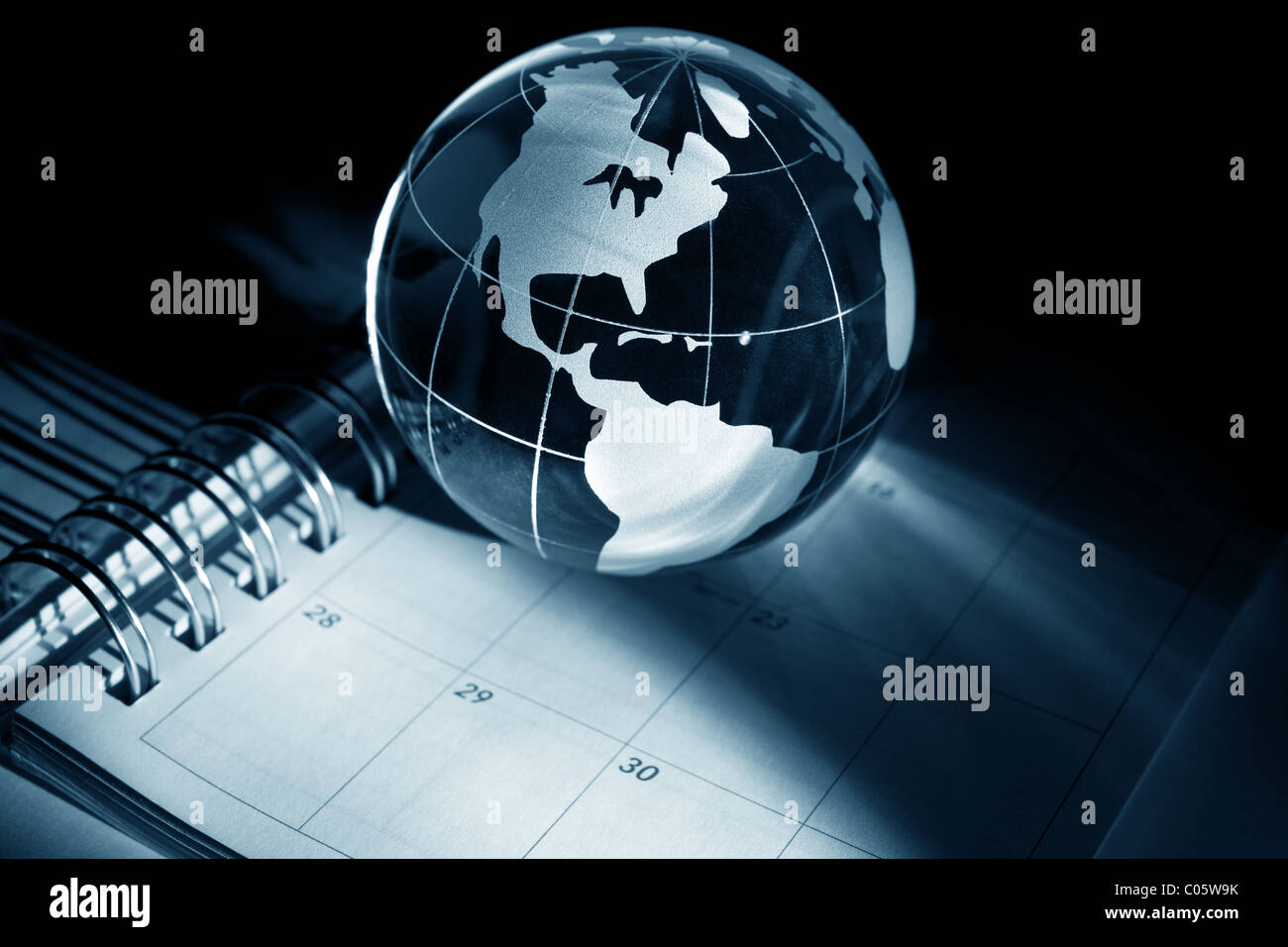 Globe and Calendar for background Stock Photo - Alamy
