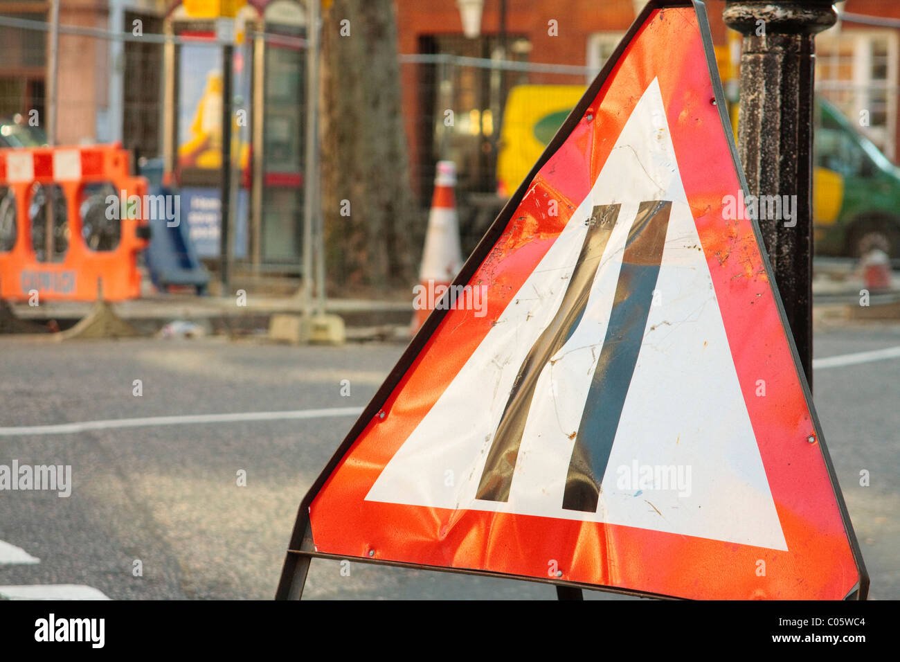Road narrowing sign hi-res stock photography and images - Alamy