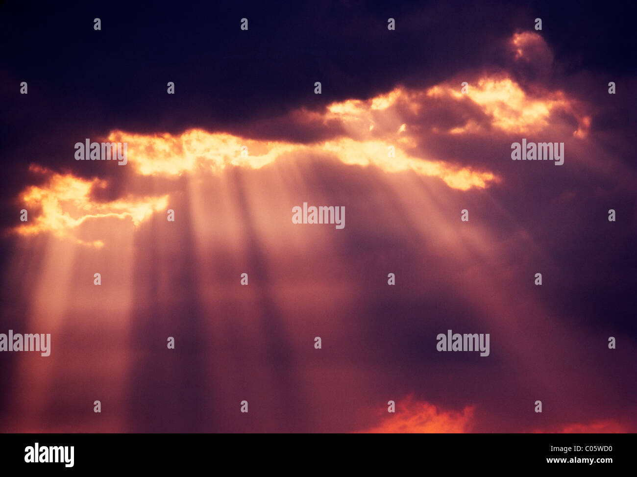 Aerial view of sunlight streaming through sunset clouds Stock Photo - Alamy