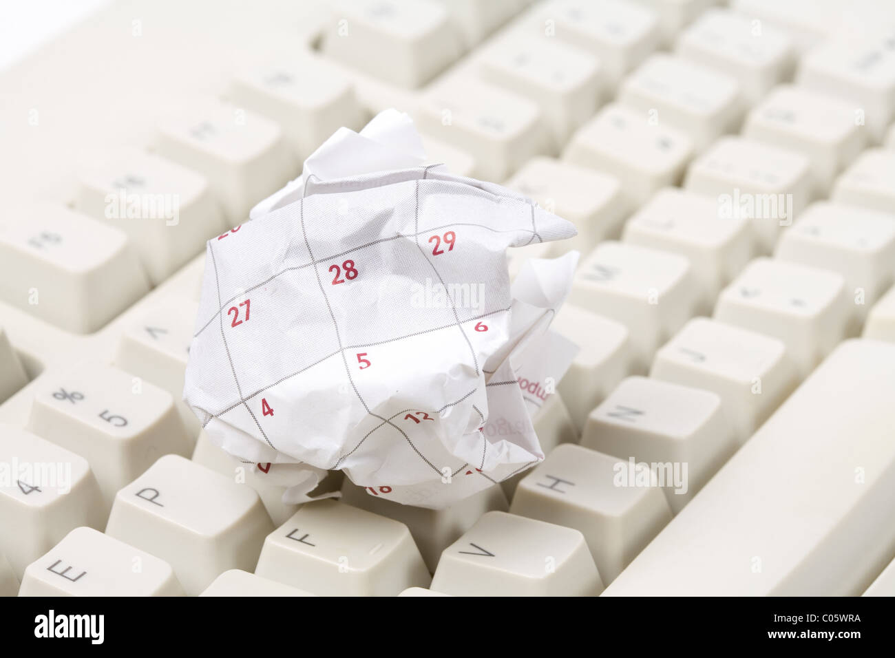 Calendar paper ball and computer mouse, concept of time planning ...