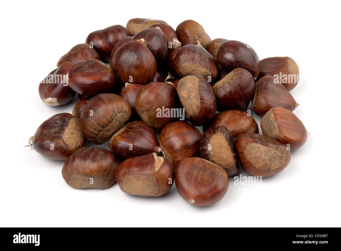 Chestnuts background on white background Stock Photo - Alamy