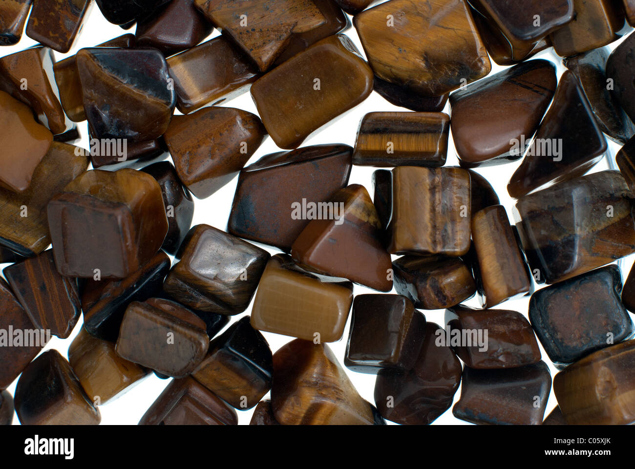 Tiger eye gravel necklace and bracelet beads background isolated on ...