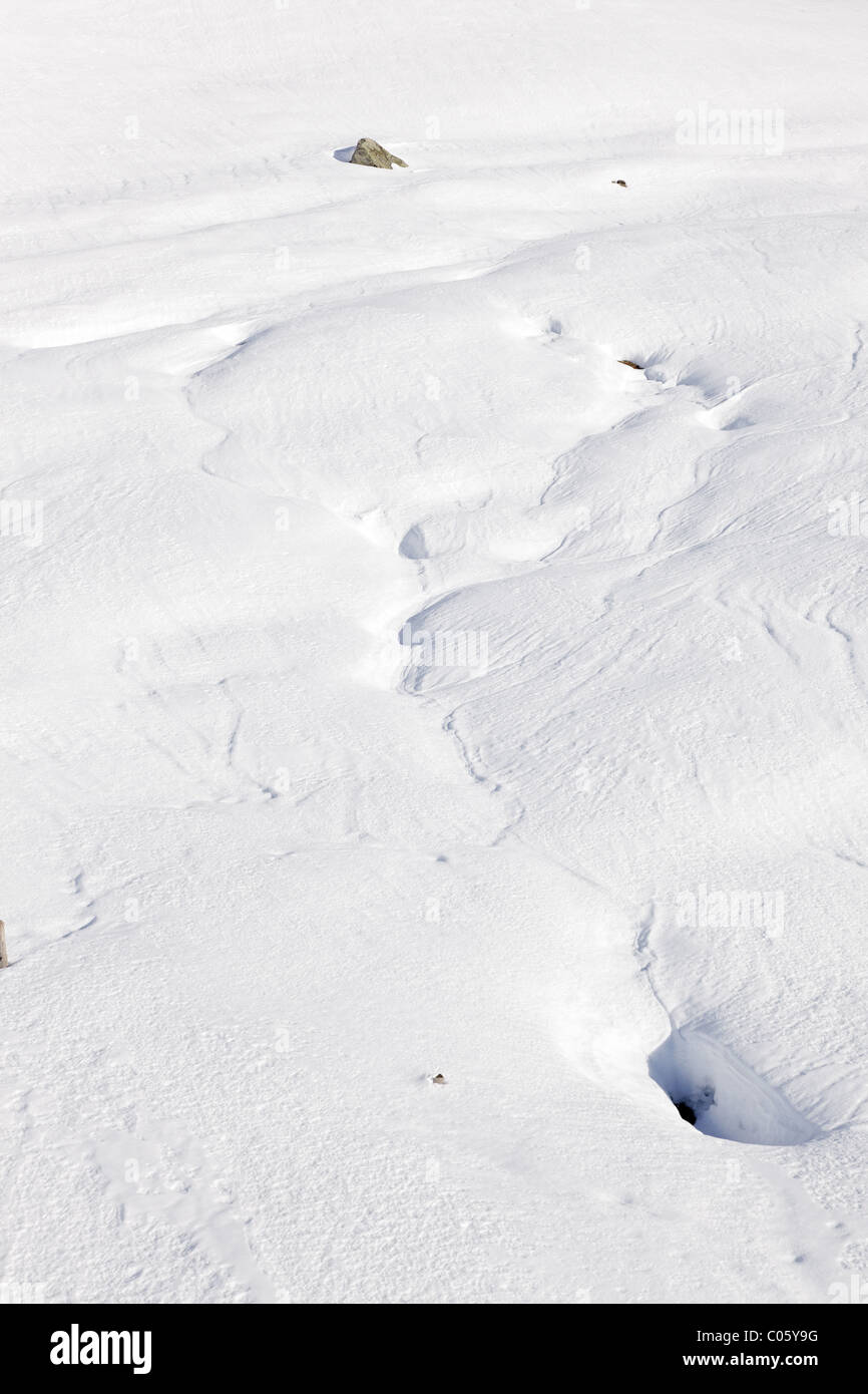 Winter snow mountain landscape with ski tracks Stock Photo - Alamy