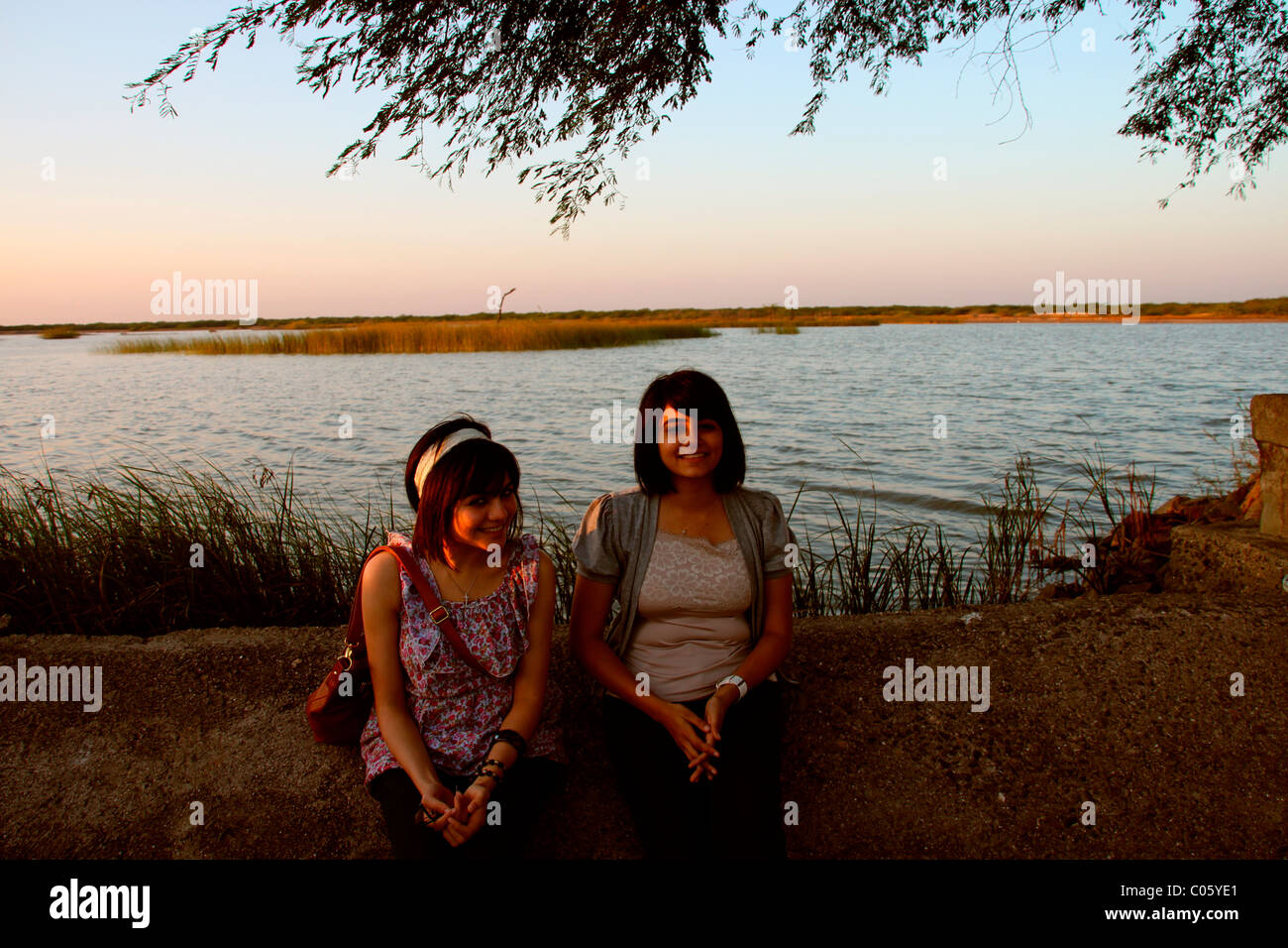 Two indian girls chit chatting hi-res stock photography and images - Alamy