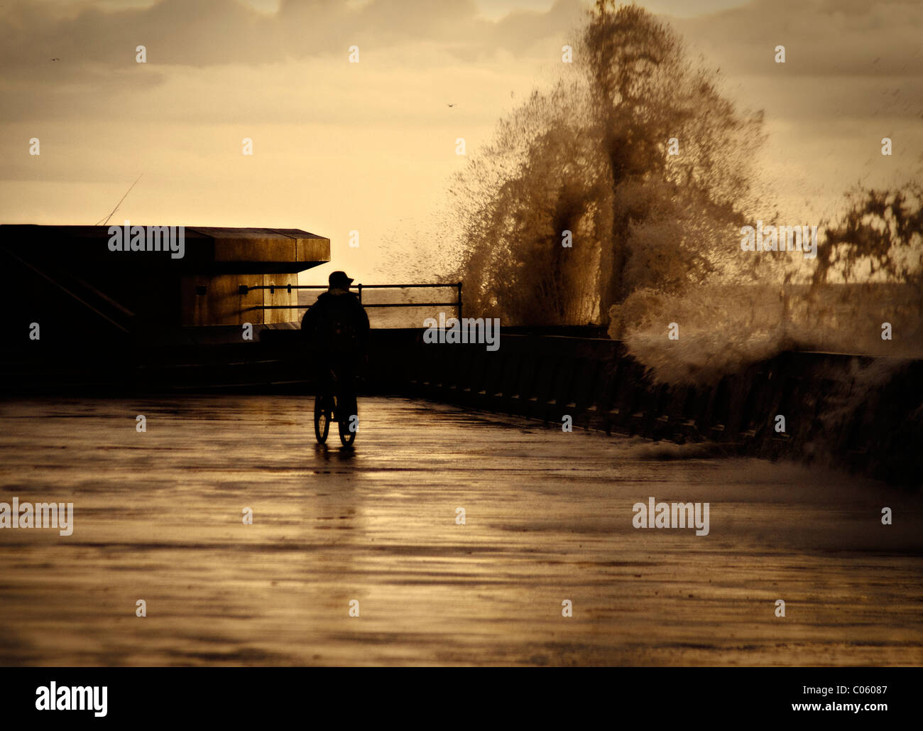 Waves crashing over the sea wall at Blackpool pier Stock Photo - Alamy
