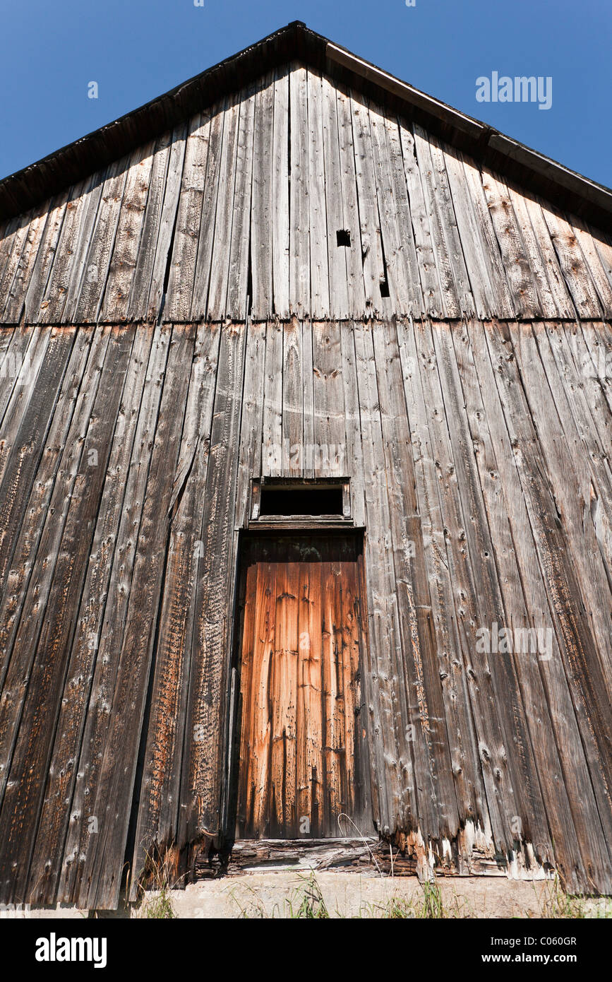 Glowing Old Barn vertical. An old barn, weathered to a warm silver ...