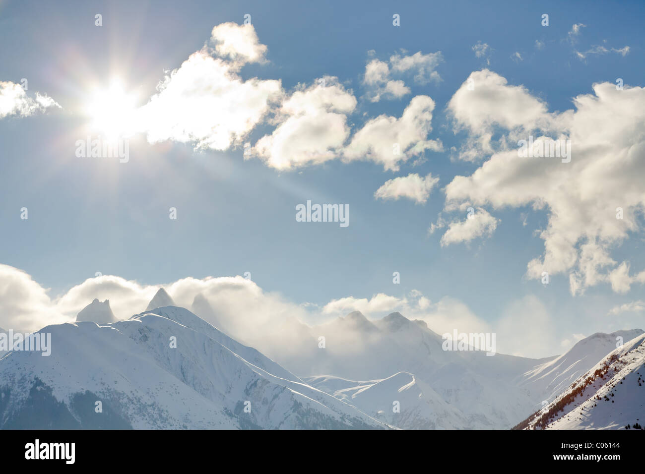 Snow mountain landscape with blue sky. Sunshine. Peaks. Rocks. Alps ...