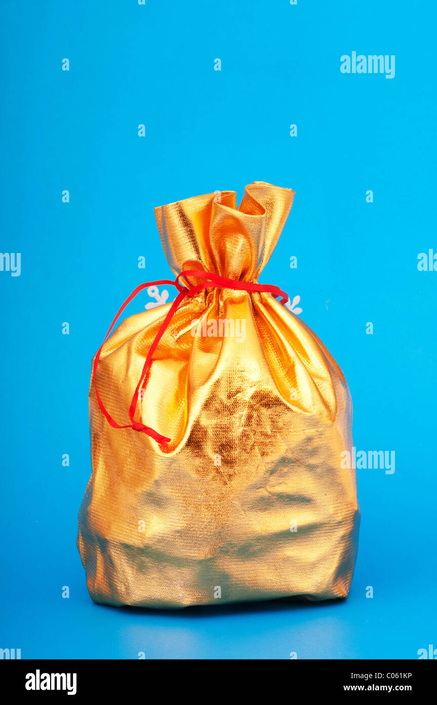Golden sacks full of something good Stock Photo - Alamy