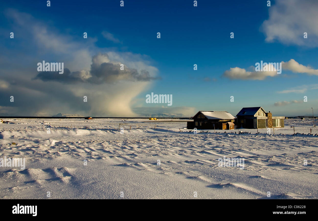 Small village lonely building after snow storm Stock Photo - Alamy