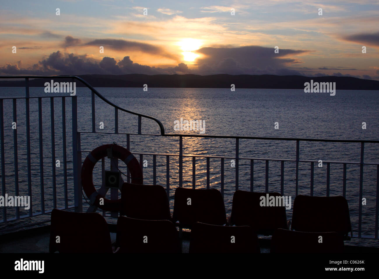Sunset from the ferry Stock Photo - Alamy