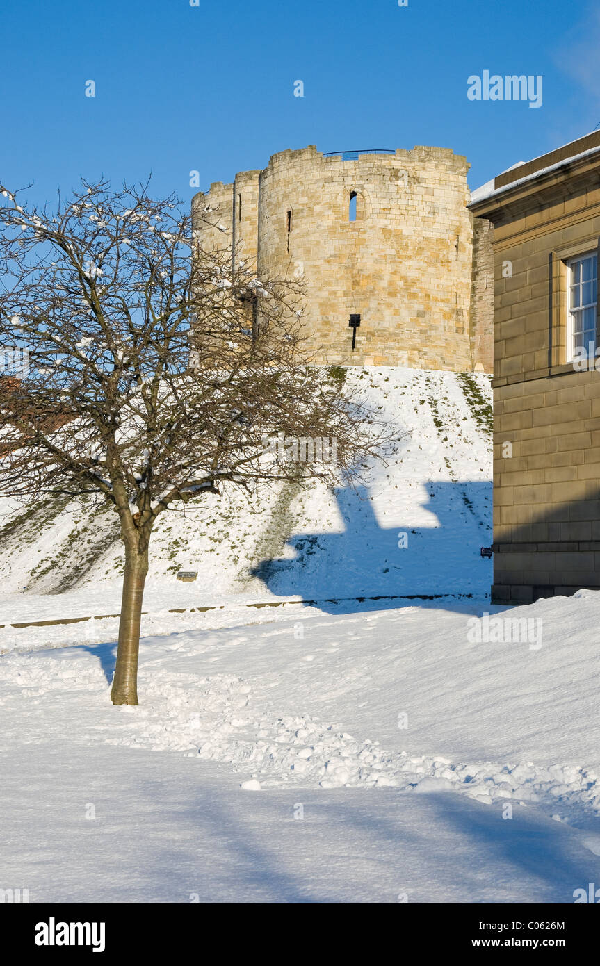 Snow covered Cliffords Tower in winter weather York North Yorkshire ...