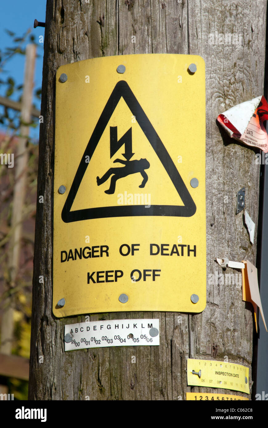 Warning sign on electricity pole hi-res stock photography and images ...