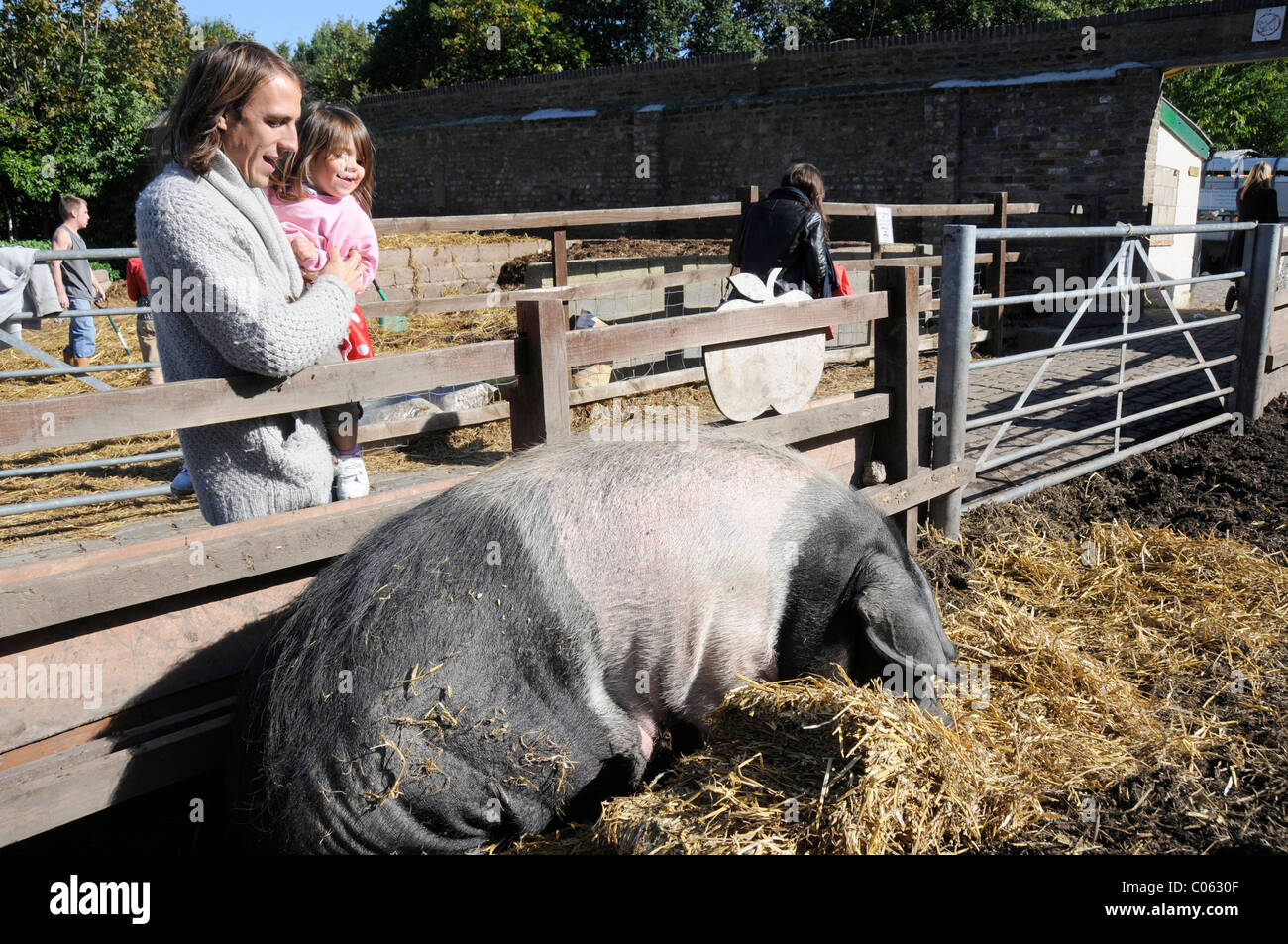 UK.Families visiting the Spitalfields City Farm in east London Stock ...