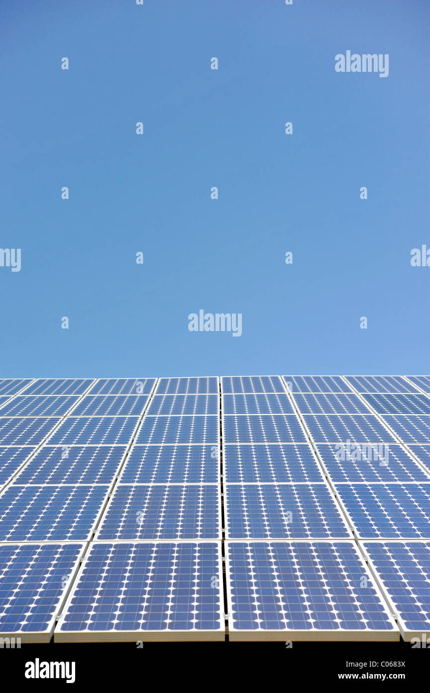 Solar panels on a roof Stock Photo - Alamy