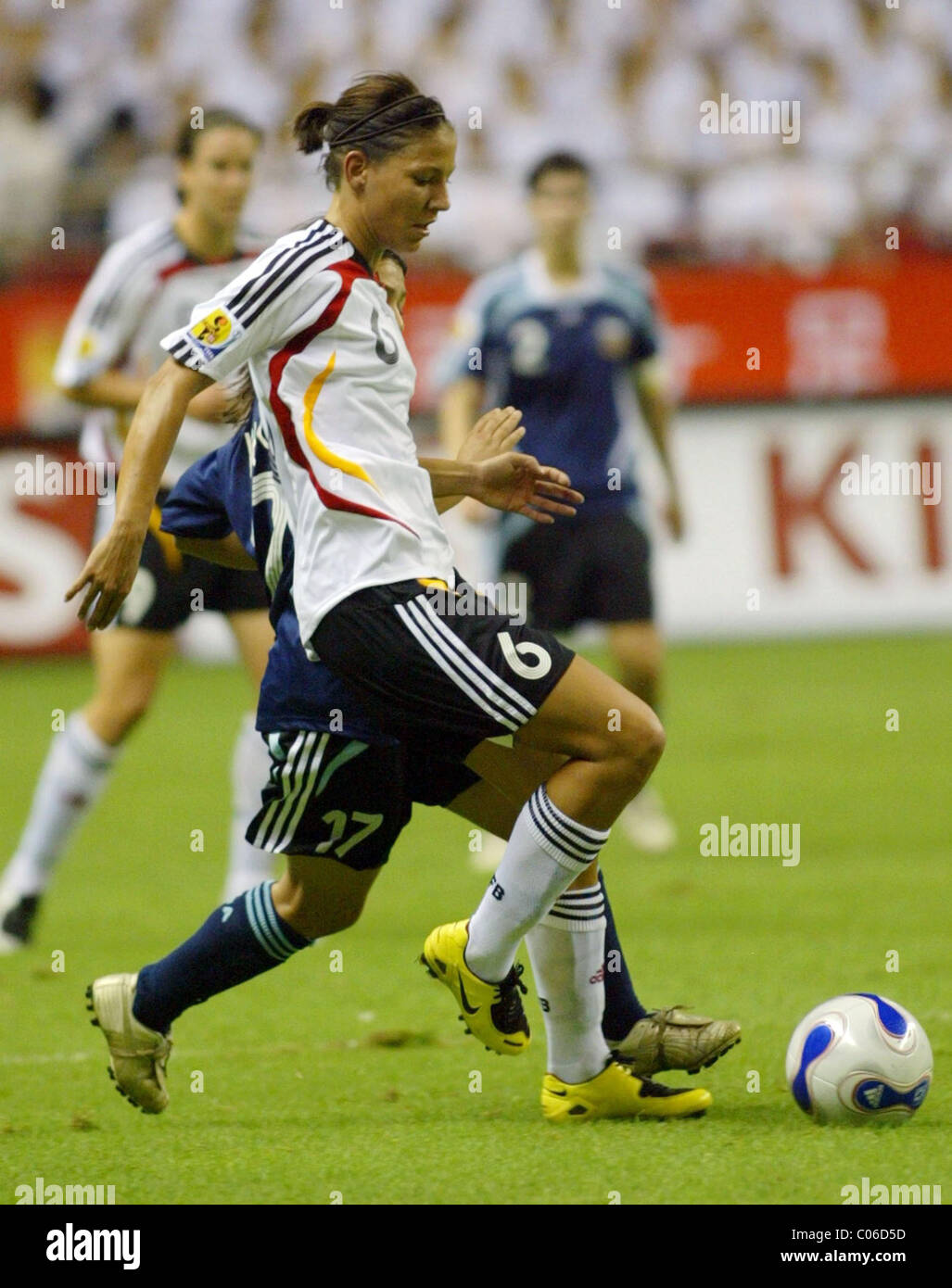 Birgit Prinz Germany began the defence of their title by beating ...