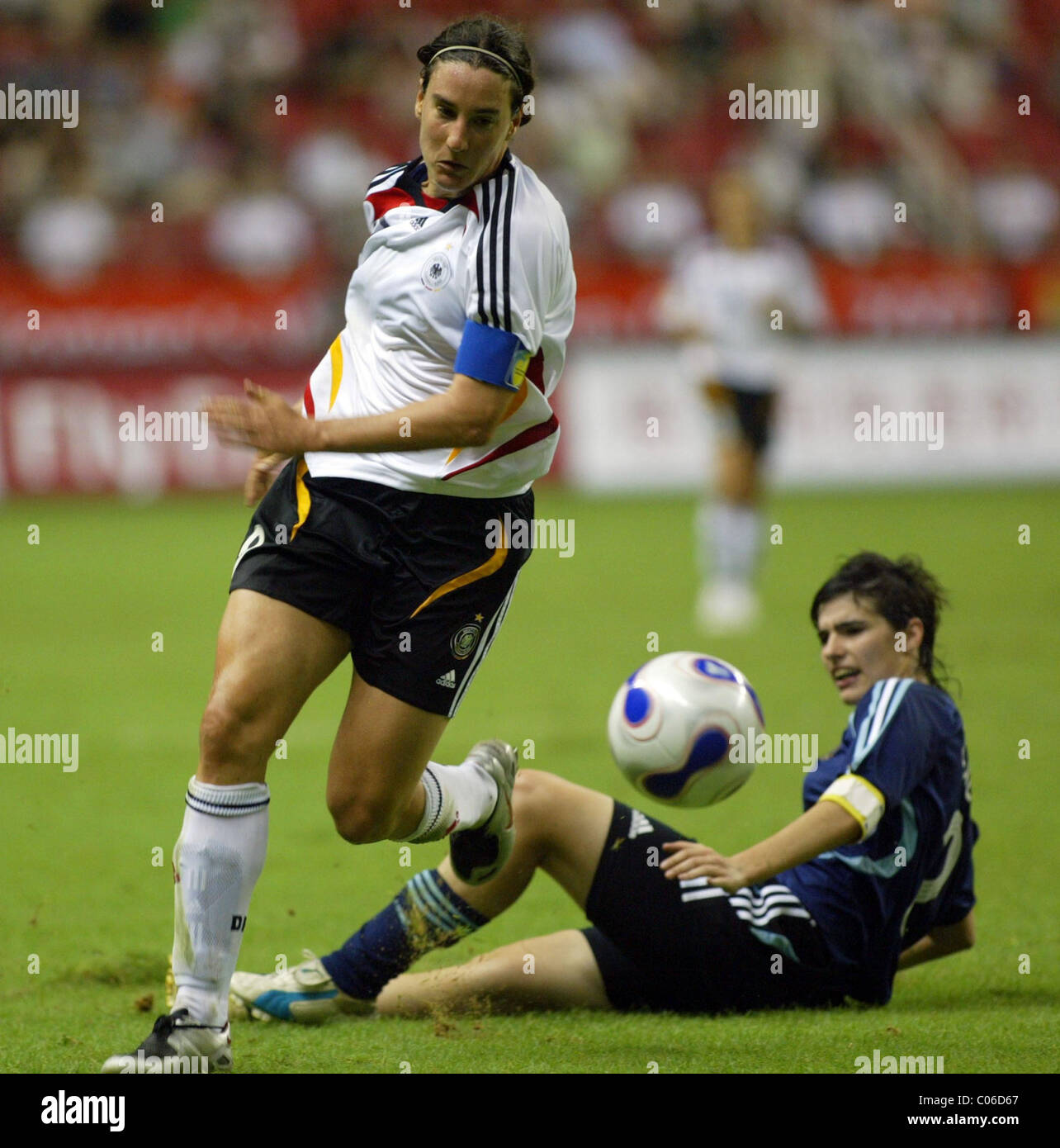 Birgit Prinz Germany began the defence of their title by beating ...