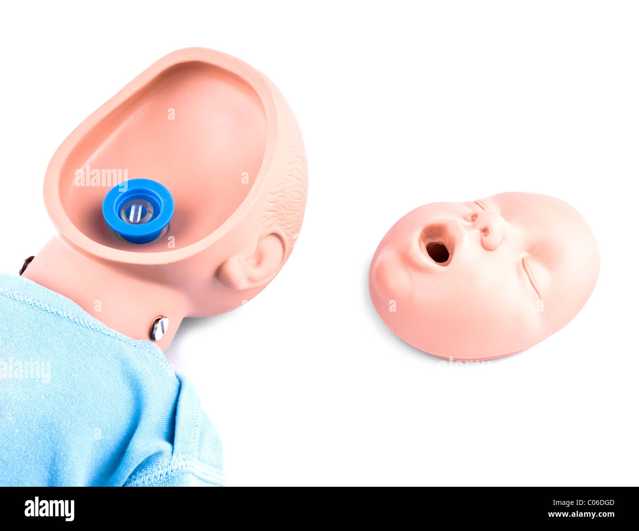 First aid training infant dummy on white background Stock Photo - Alamy