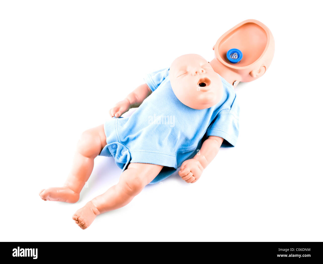 First aid traning infant dummy on white background Stock Photo - Alamy