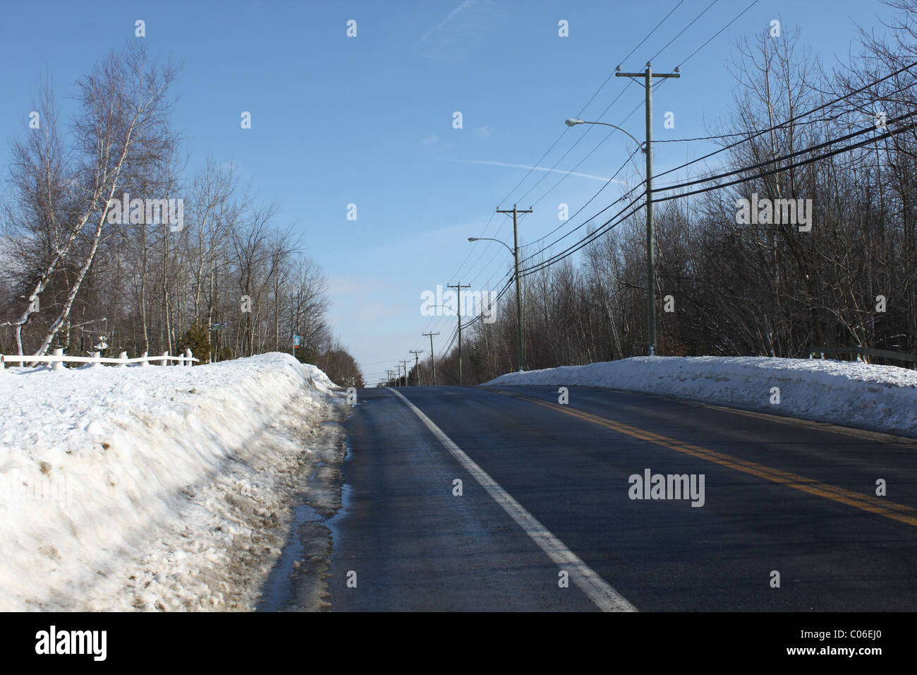 Hydro wires along the road in winter Stock Photo - Alamy