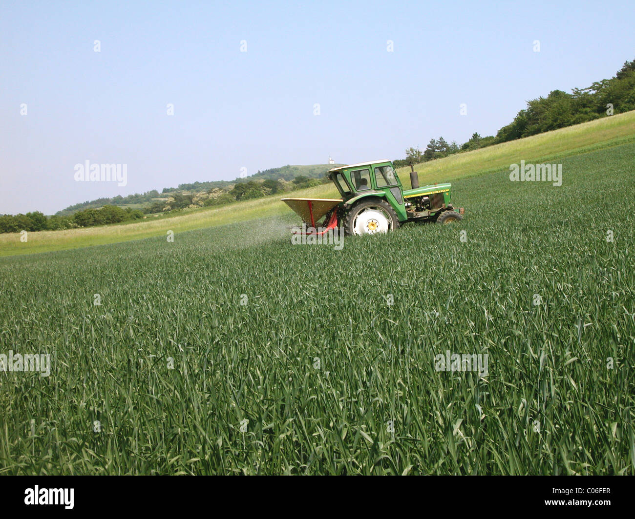 Farmer working in the fields Stock Photo - Alamy