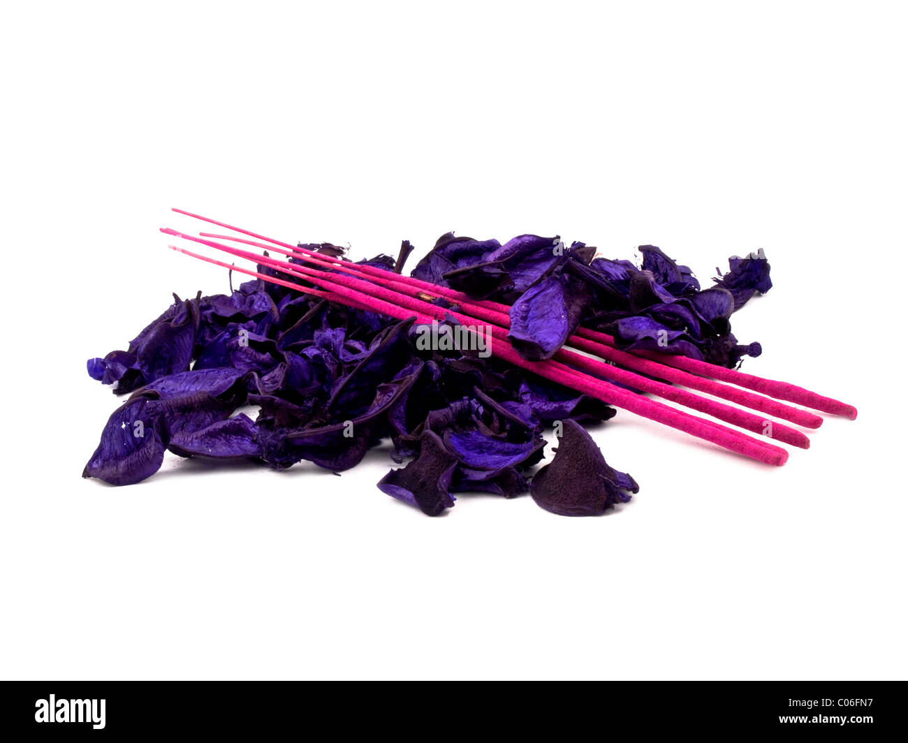Aromatic purple potpourri and pink incenses on white background Stock ...