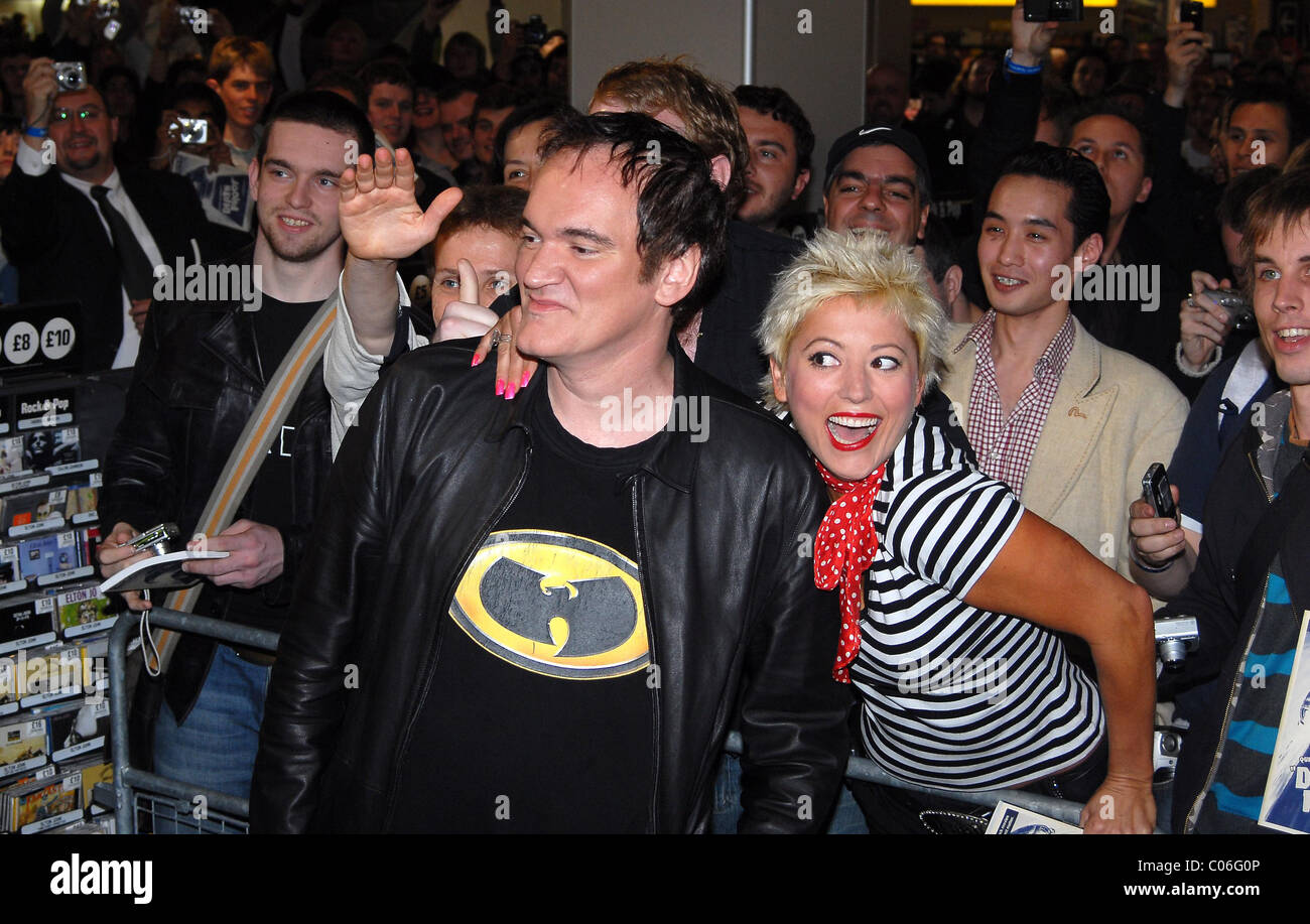 Quentin Tarantino signs copies of the script for his latest movie ...