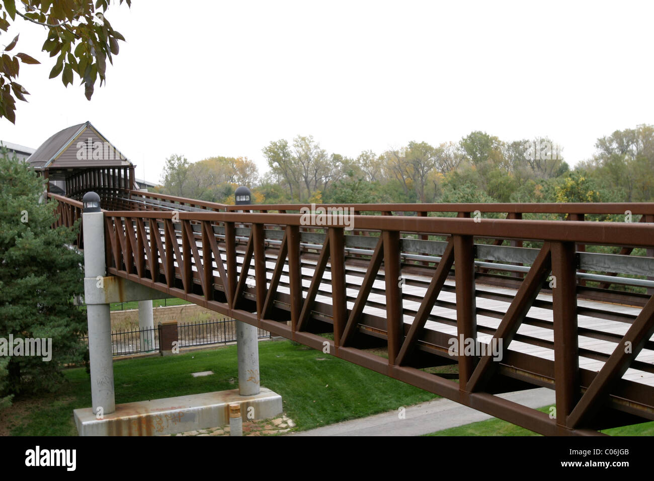 Walk bridge over railroad tracks Stock Photo - Alamy