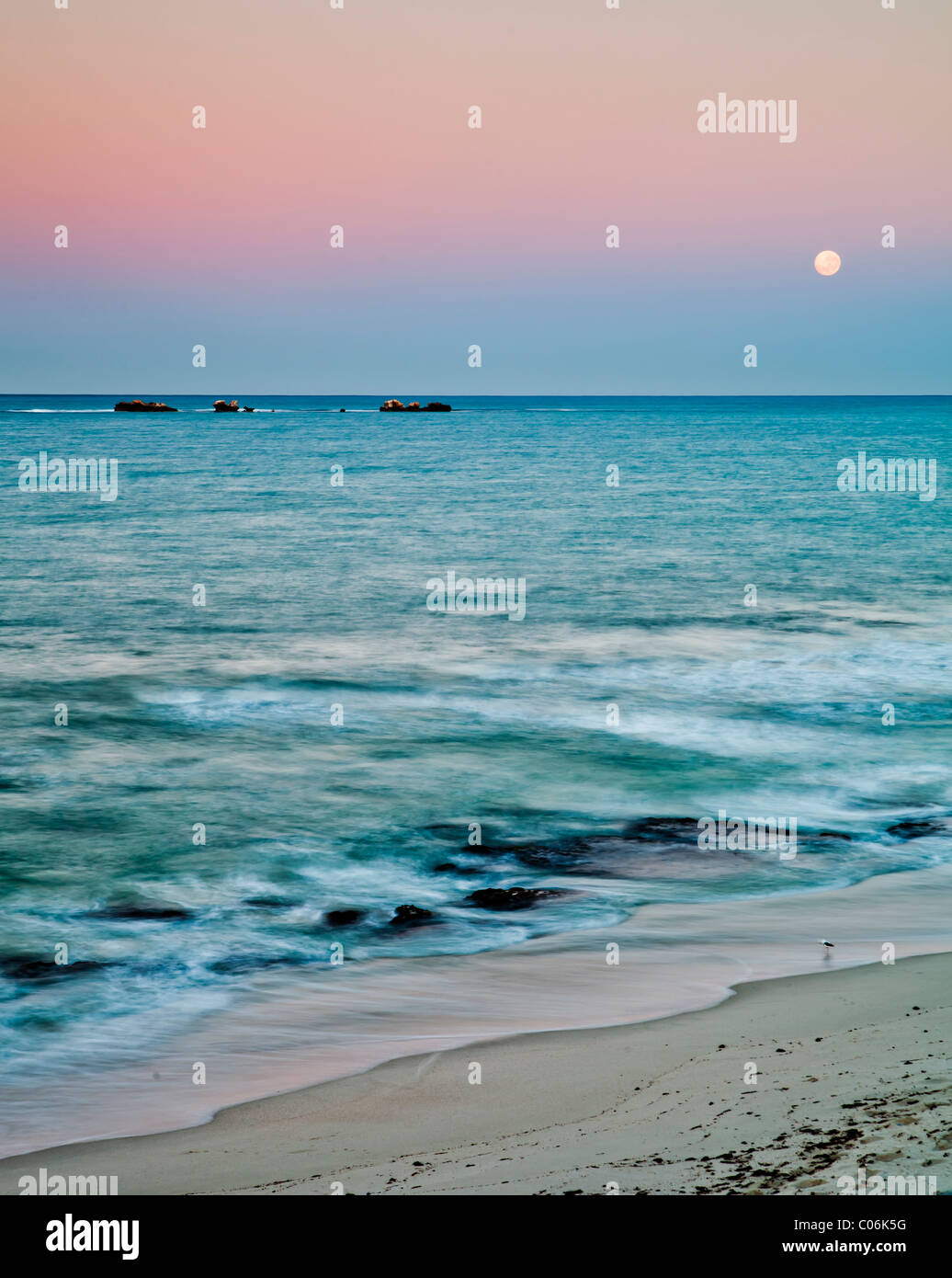 Other-worldly Indian ocean moonset, Burns Beach Stock Photo - Alamy