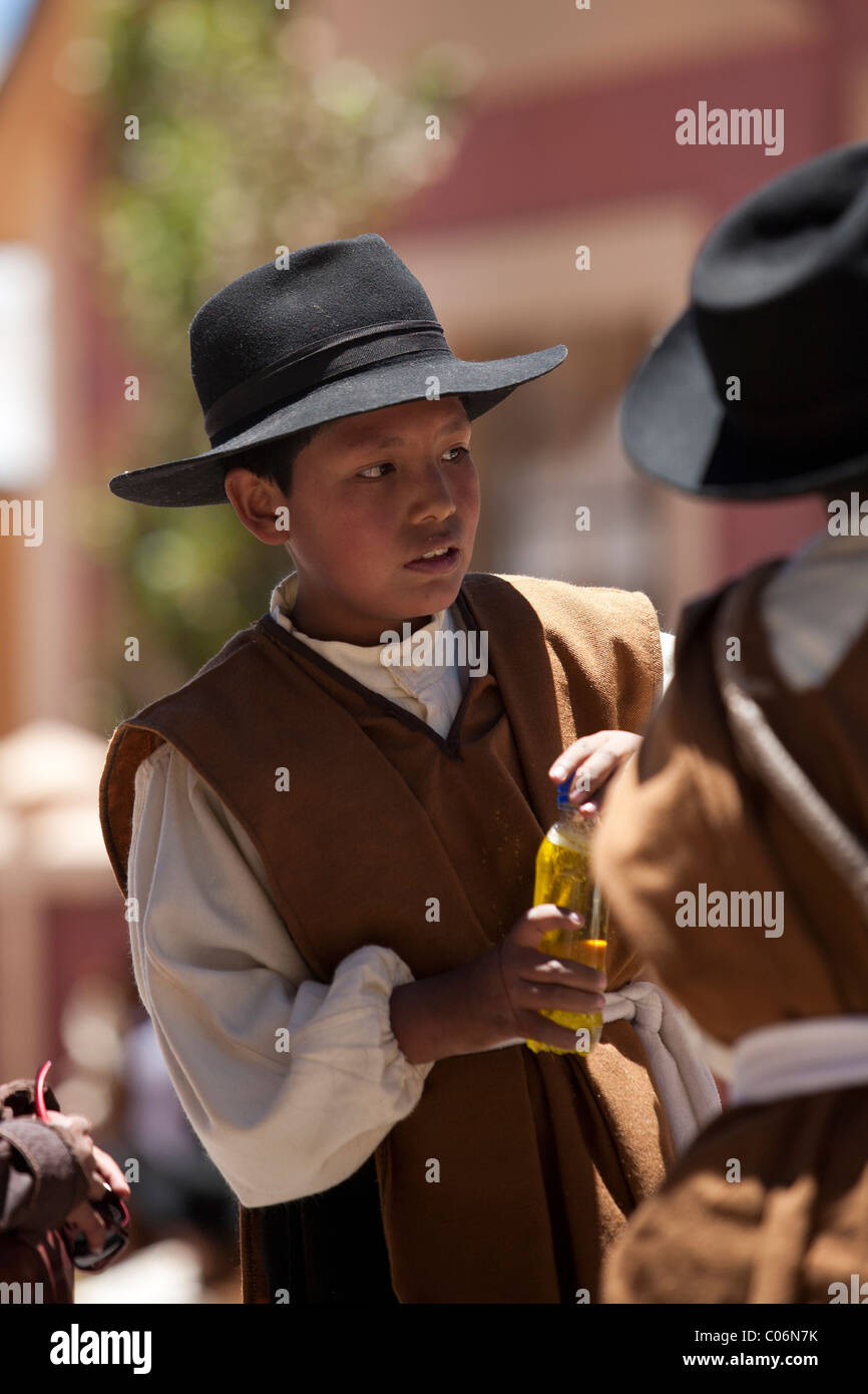 A school boy in costume during the parade and celebrations for Puno ...