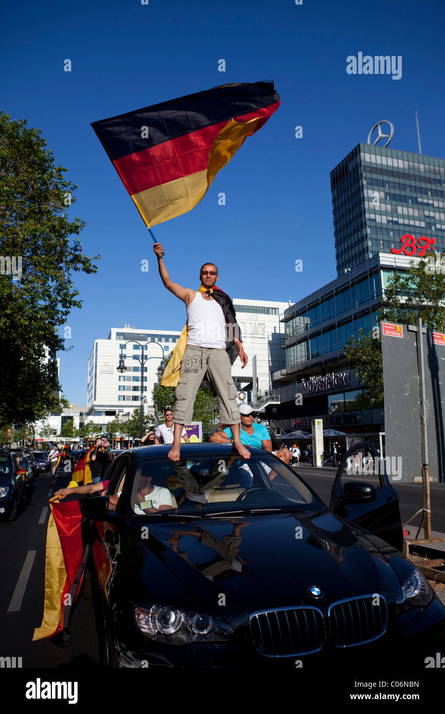 Fans cheering after the eight final match of the Football World Cup ...