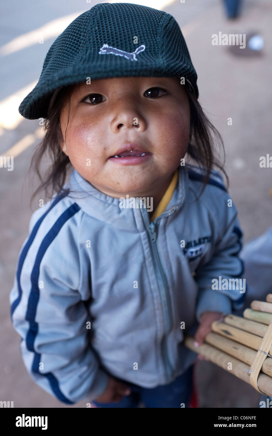 A portrait of a Peruvian child in costume during celebrations for Puno ...