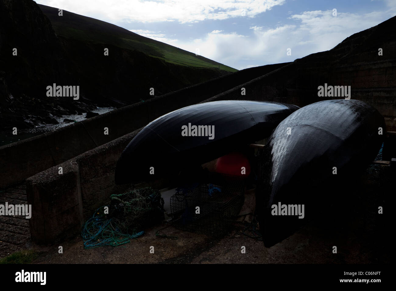Upturned Curraghs in Dunquin Harbour, Dingle Peninsula, County Kerry ...