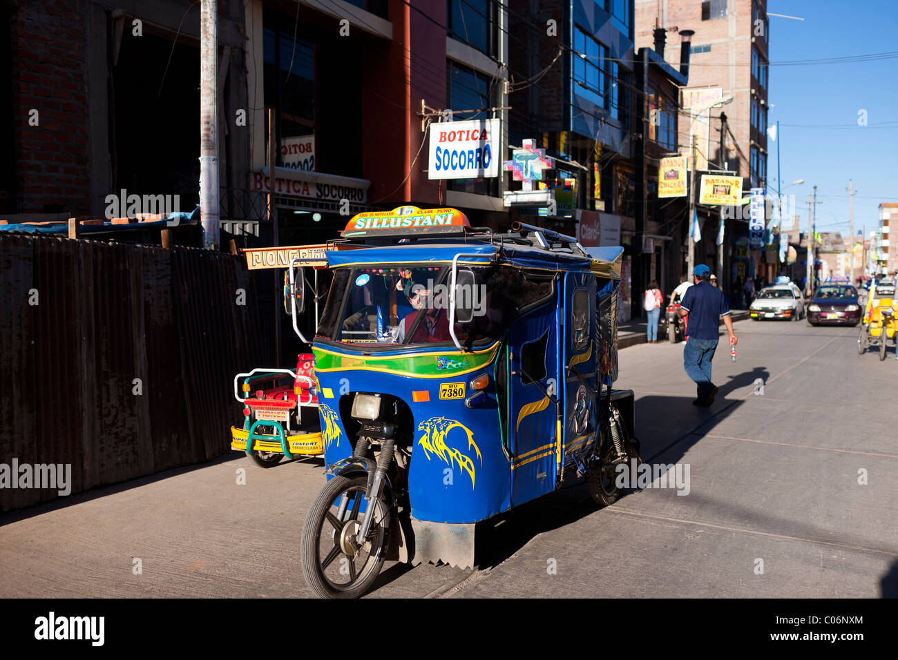 A tuk tuk taxi cab on the streets of Puno Peru Stock Photo - Alamy